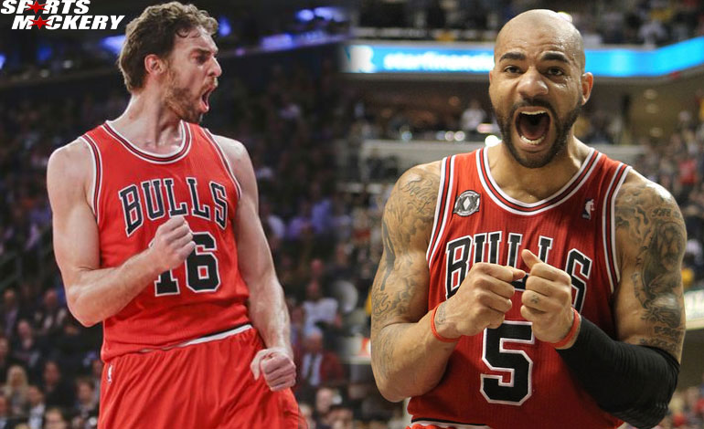 Chris Paul clowns Carlos Boozer dribbling the ball between his legs ...